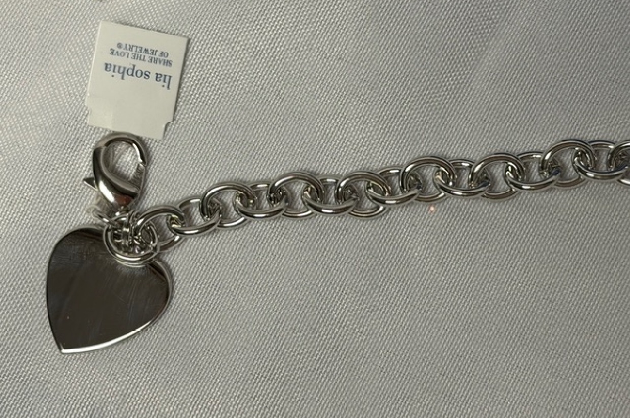 Silver Heart Charm bracelet — 2025 A Home for the Holidays Auction ...